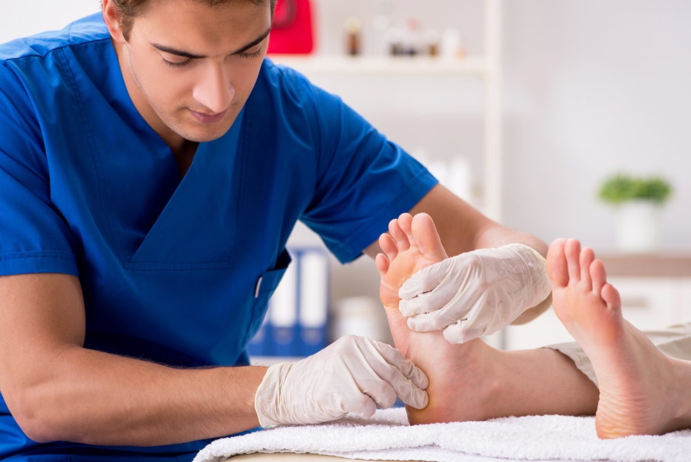 Podiatrist treating feet during procedure - Mount Lawley Physiotherapy